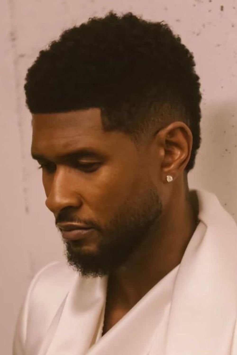 9 Stylish Usher-Inspired Haircuts to Rock Now