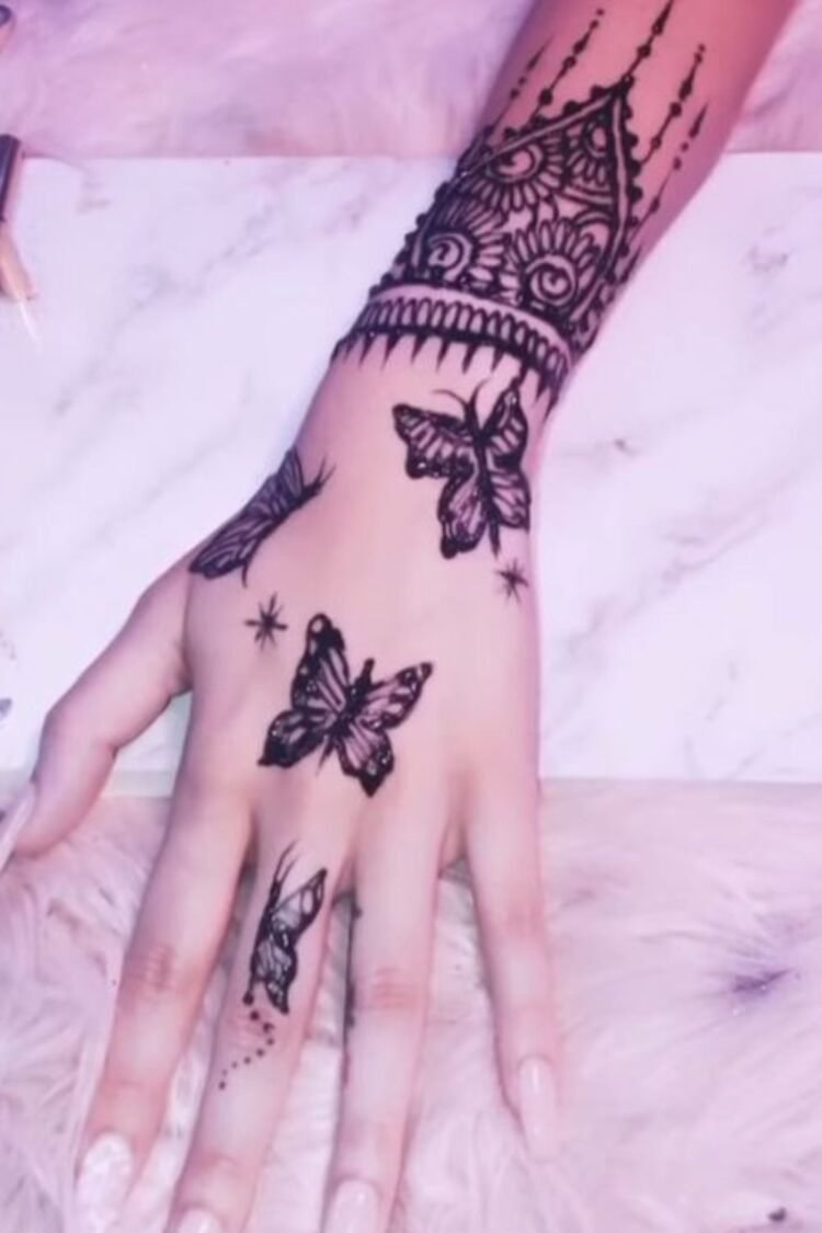 Top 23 Butterfly Hand Tattoo Ideas to Embrace Elegance