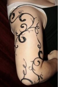 Top 15 Vine Tattoos That Embrace Artistry & Organic Beauty
