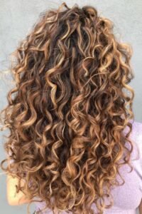 16 Chic Honey Brown Curls Hairstyles for a Glamorous Upgrade