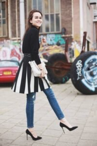 15 Skirt Over Jeans Outfits That Make Layering Look Effortless